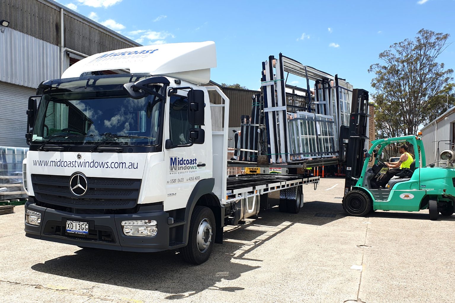 A new Atego 1224 with a custom 9.6m tray delivered to Midcoast Windows ...